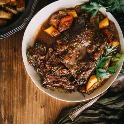 Classic Dutch Oven Pot Roast Recipe with Veggies - Girl Carnivore